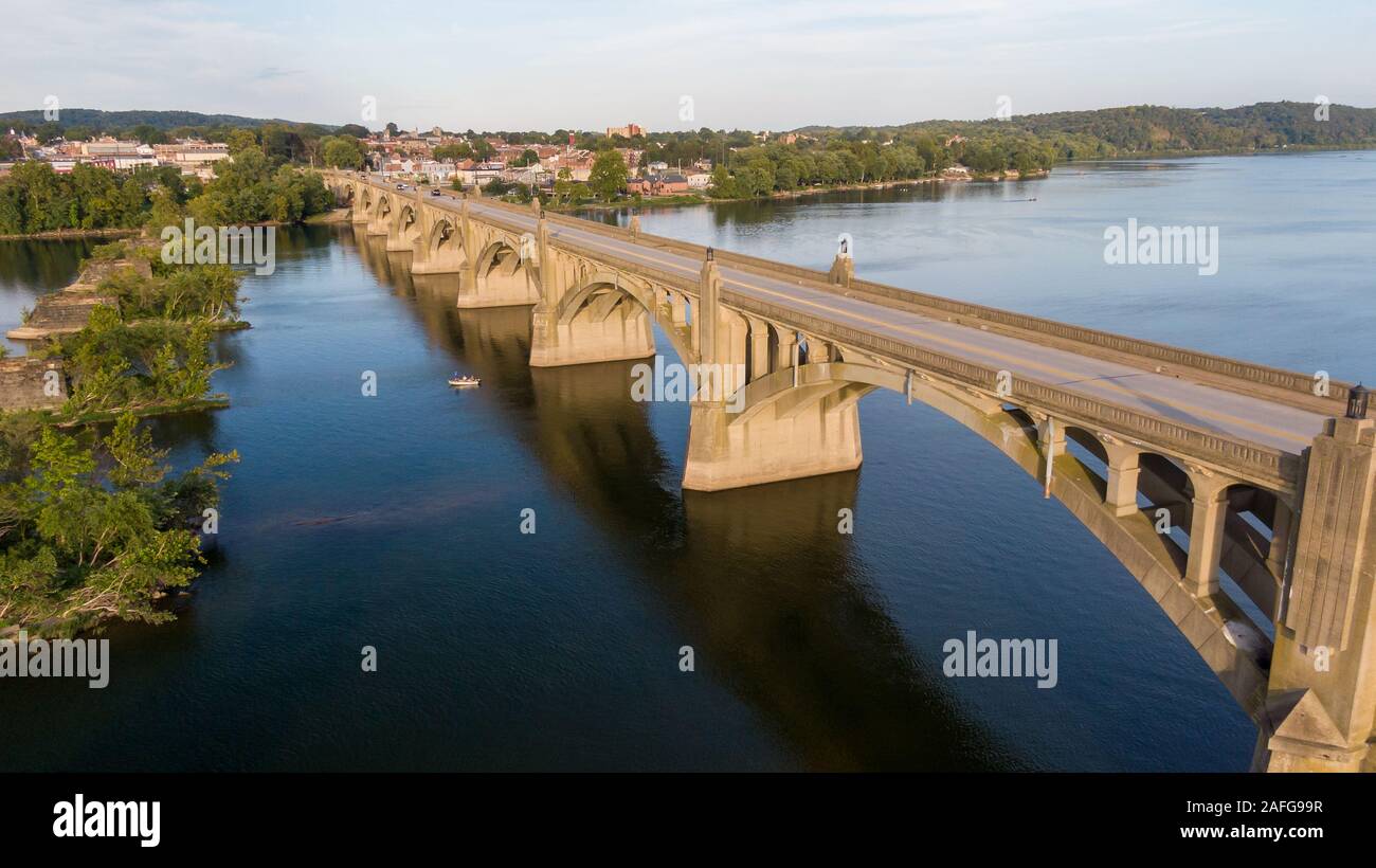 Arched bridge across river, classic architecture, aerial view of the ...