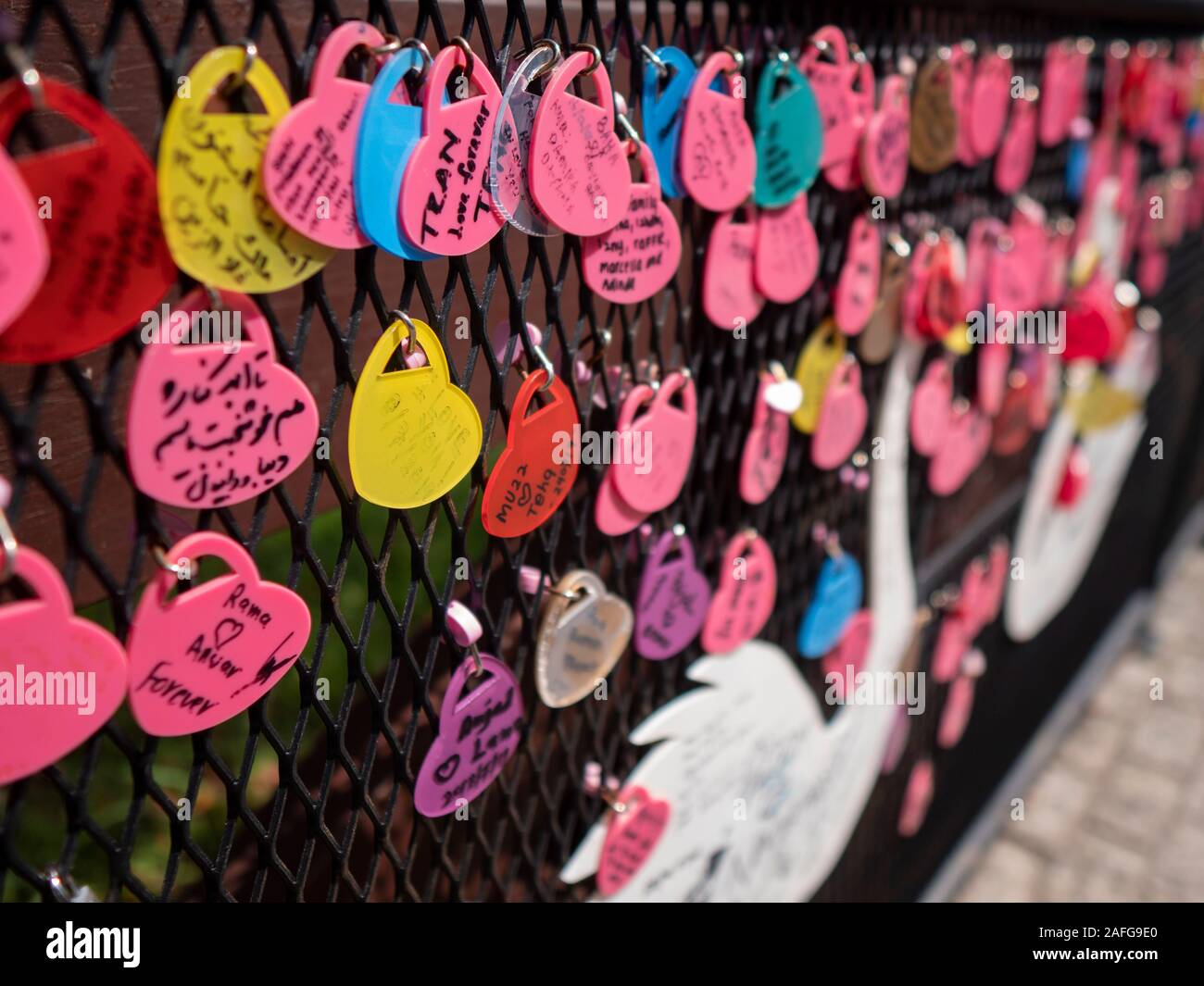 Lovers put colorful wish notes on wish wall on French village Malaysia ...