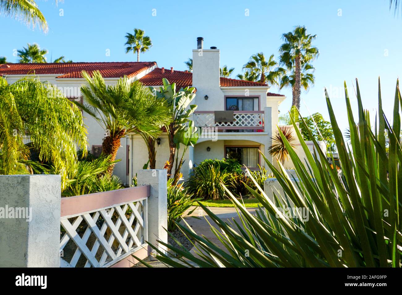 Typical Southern California Spanish style residential condo surrounded ...