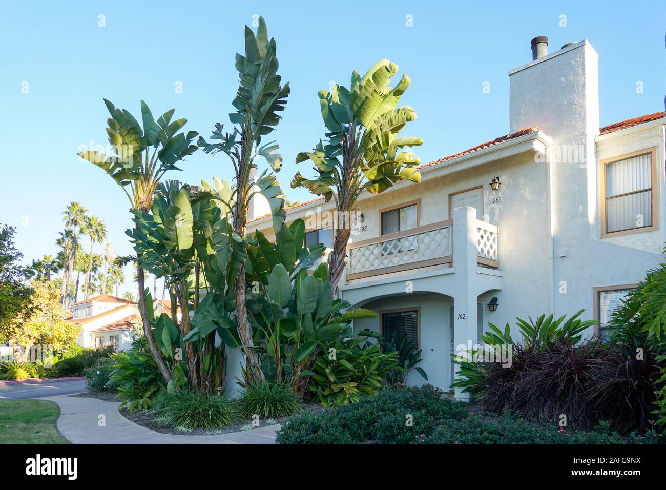Typical Southern California Spanish style residential condo surrounded ...