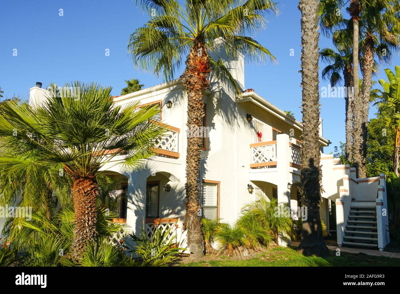 Typical Southern California Spanish style residential condo surrounded ...