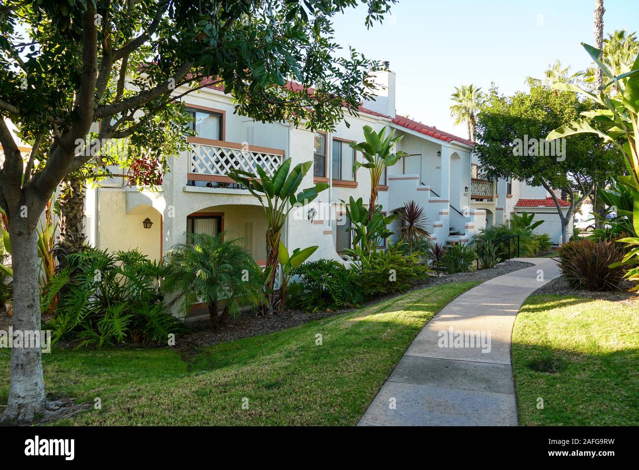 Typical Southern California Spanish style residential condo surrounded ...