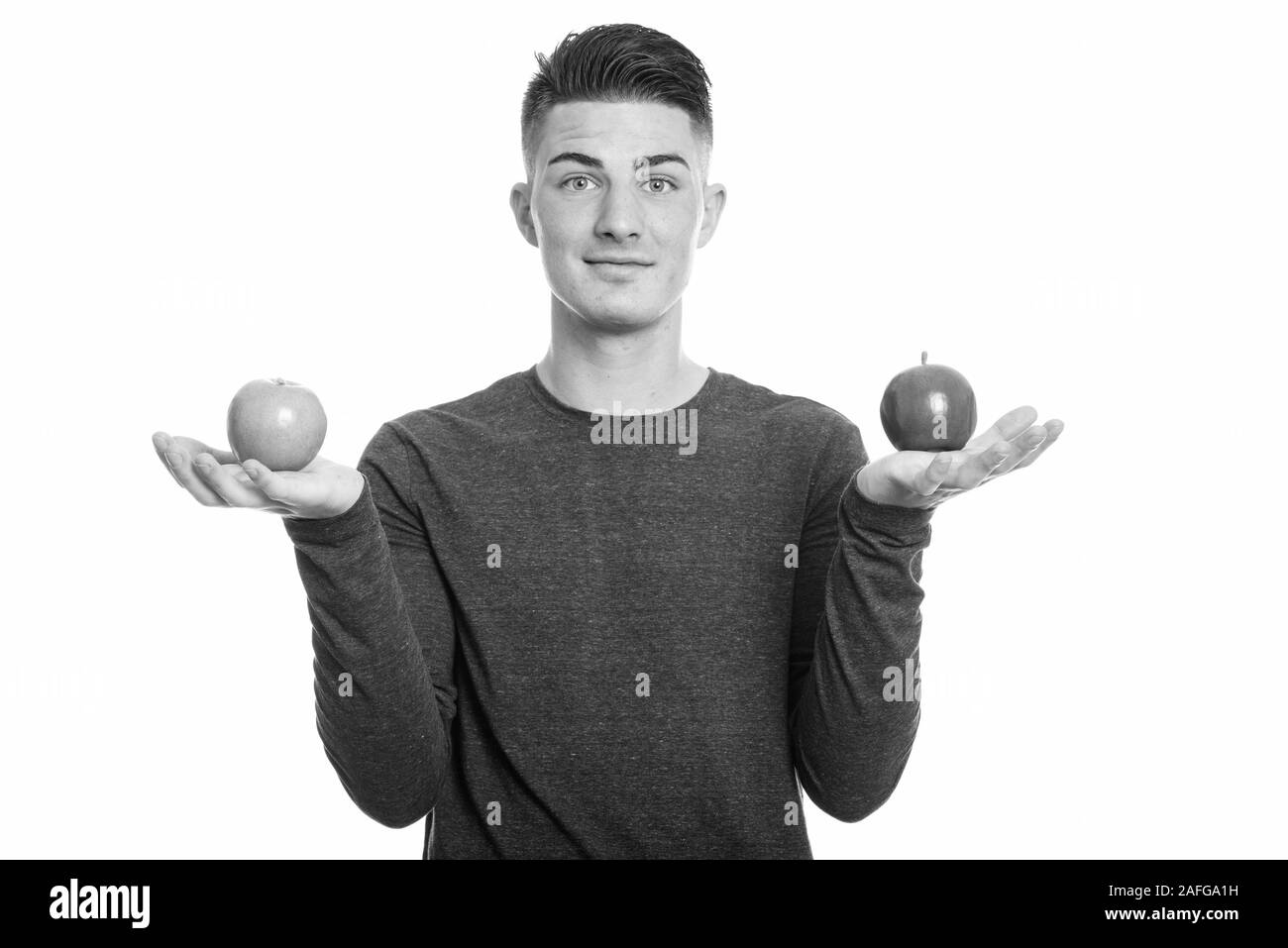 Handsome man apple Black and White Stock Photos & Images - Alamy