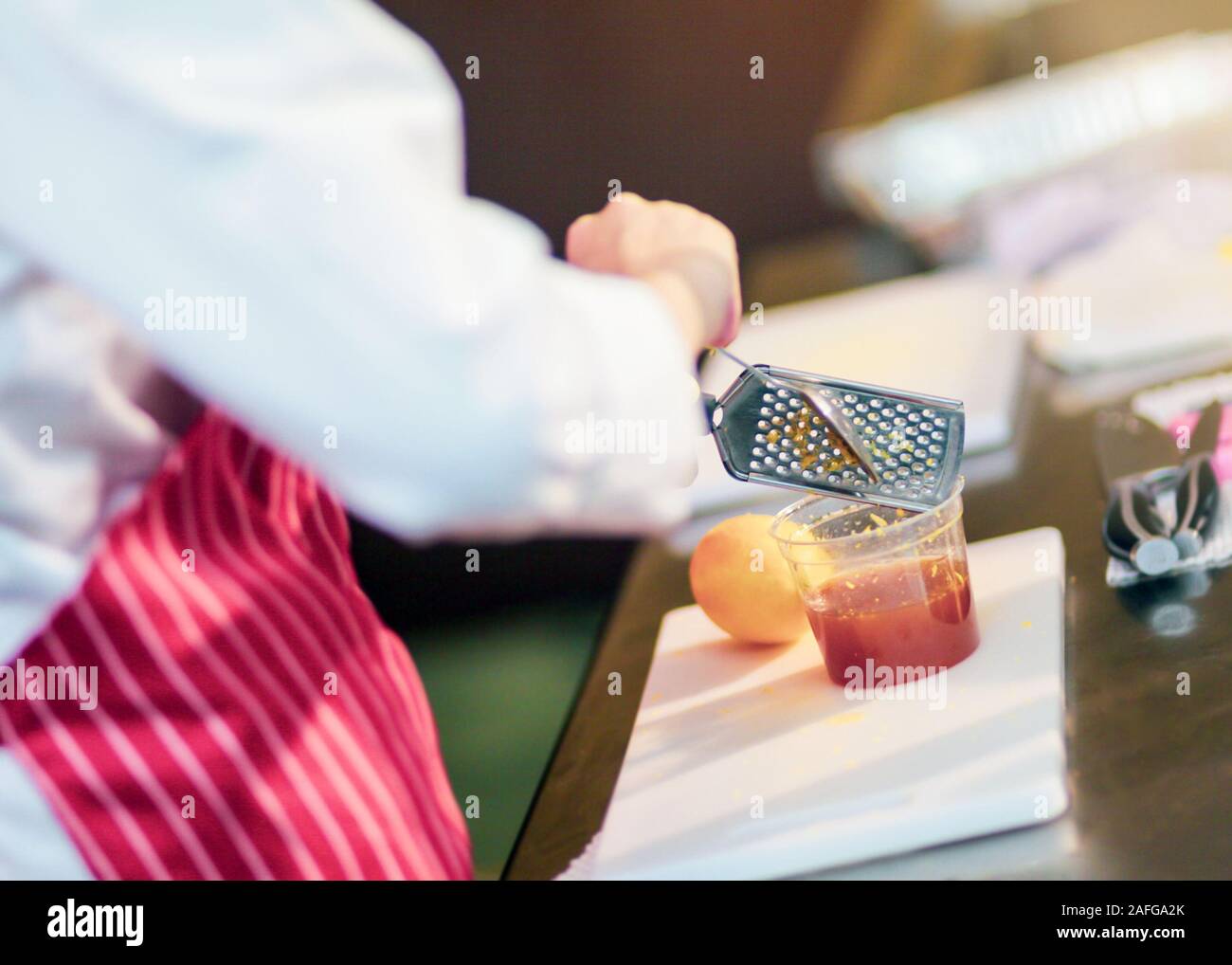 Chef preparing recipe soup hi-res stock photography and images - Alamy