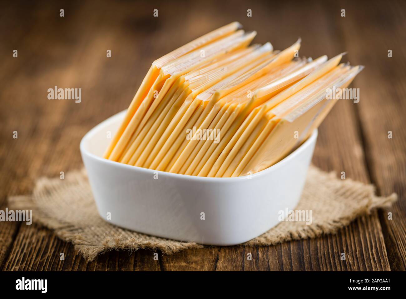 Sliced cheddar cheese gourmet hi-res stock photography and images - Alamy