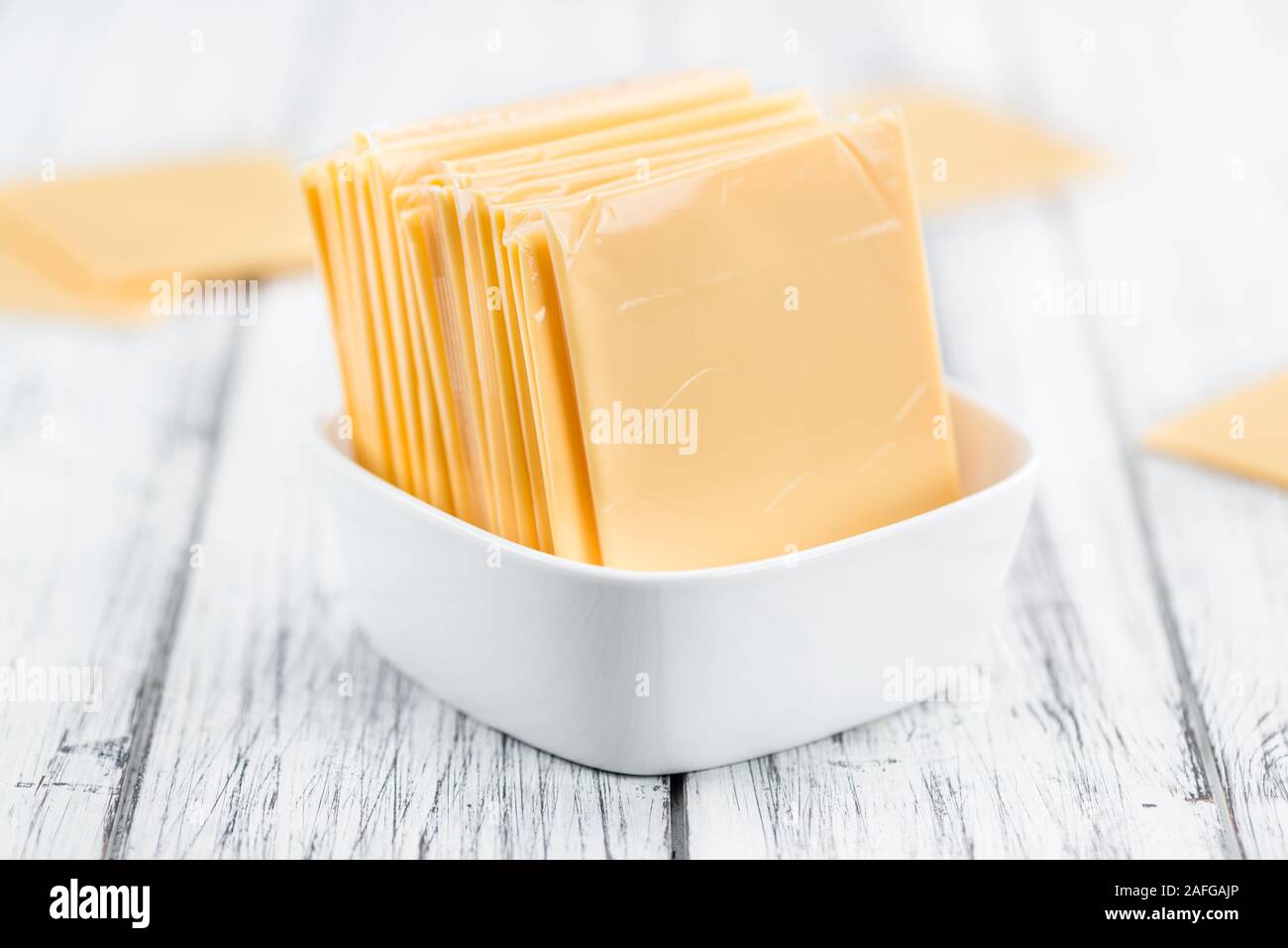 Portion of cheddar cheese hi-res stock photography and images - Alamy