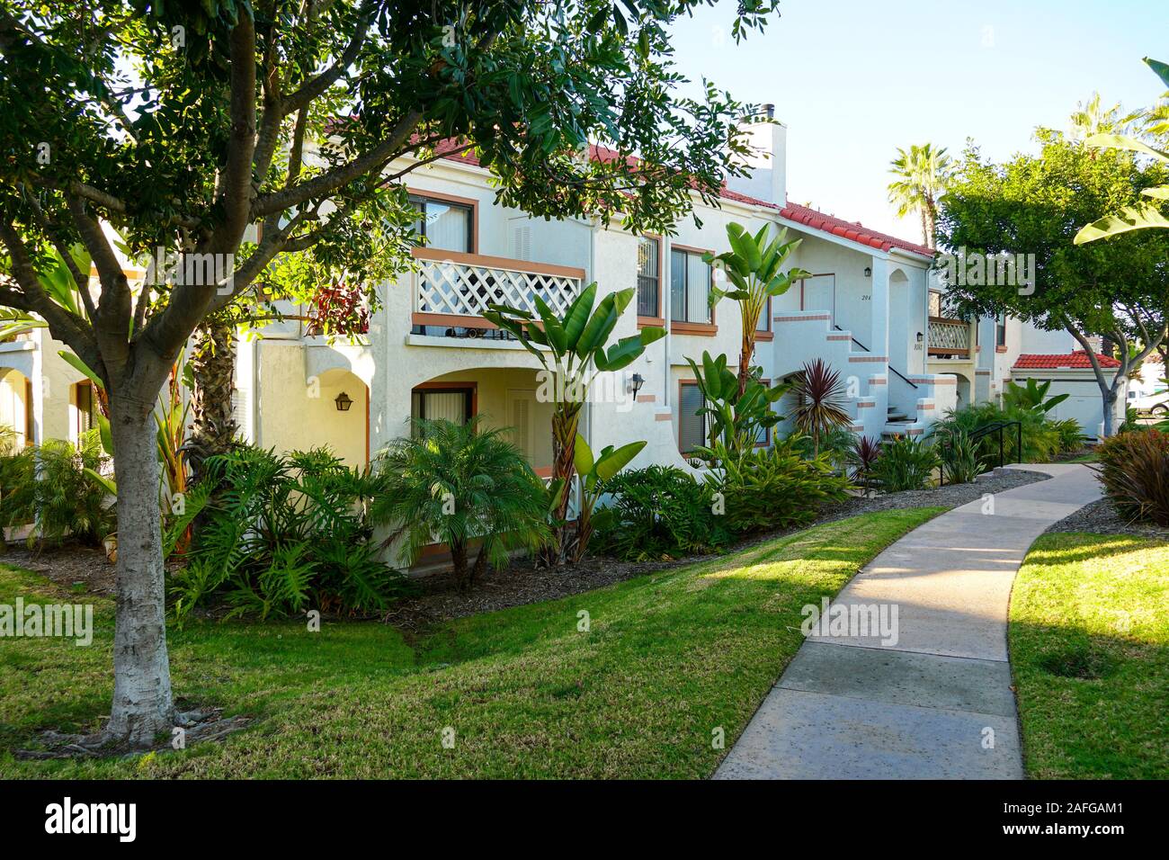 Typical Southern California Spanish style residential condo surrounded ...