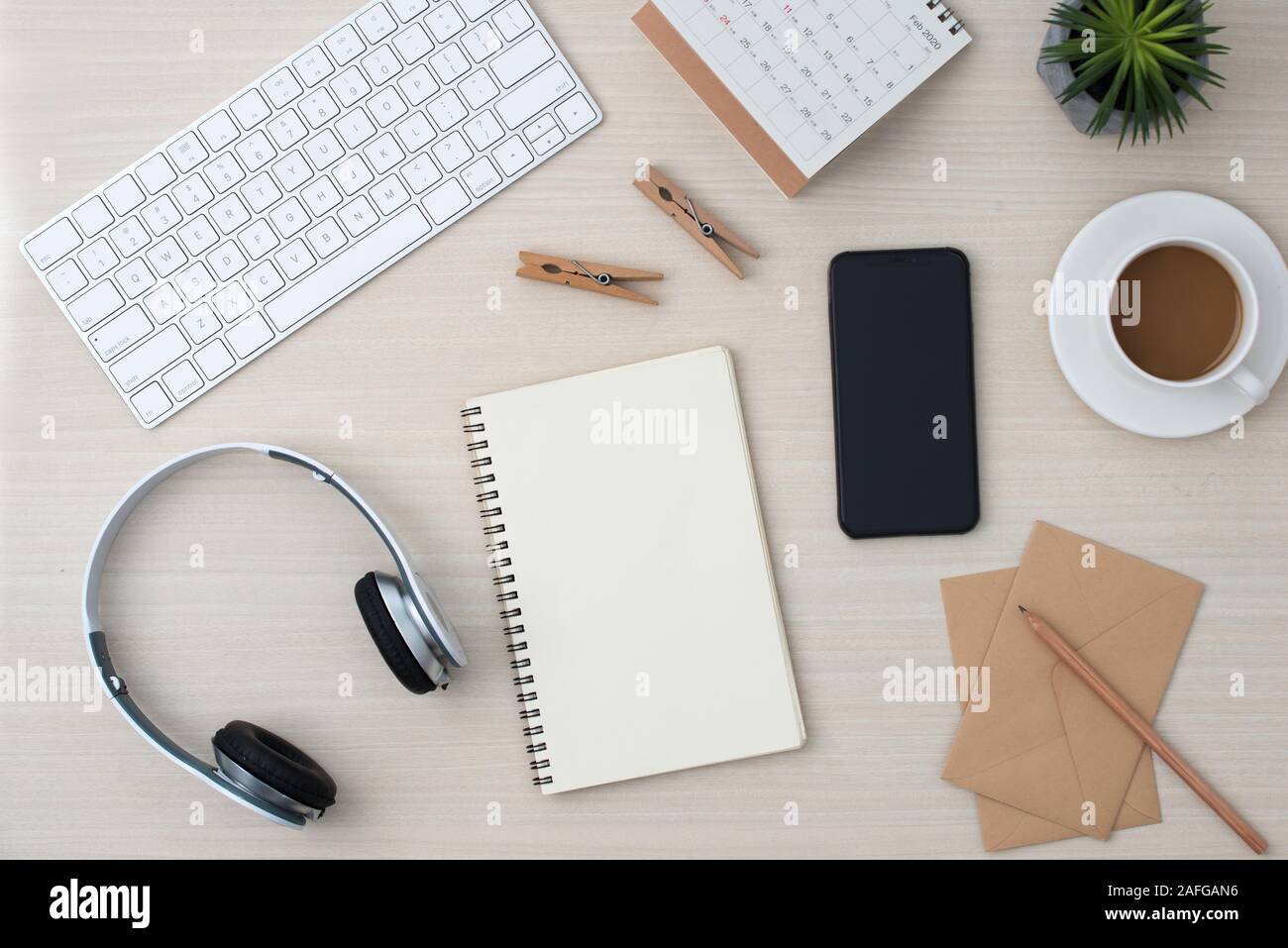 Desk of musician for songwriter work with headphones and smartphone on ...