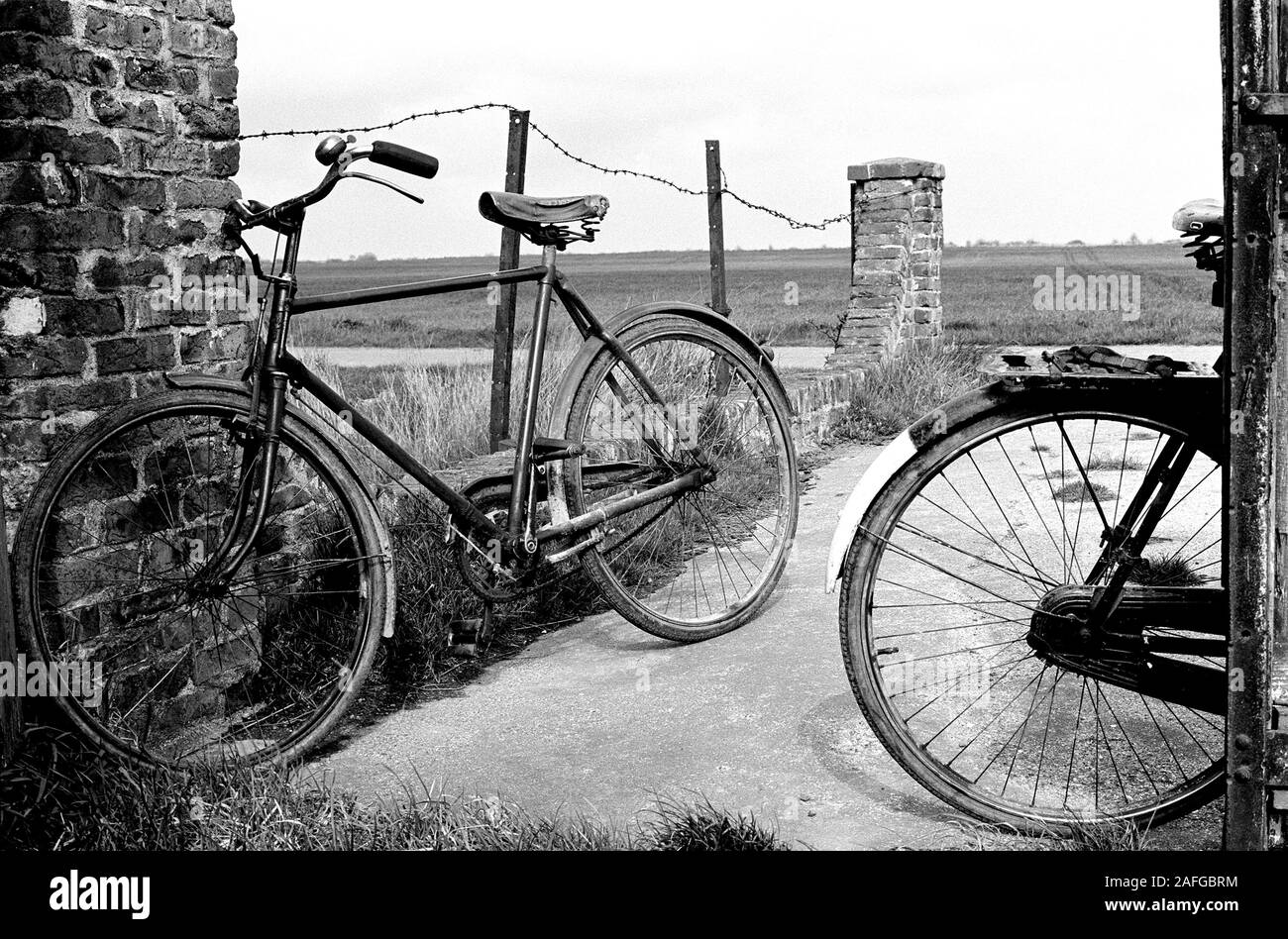 Bikes leaning wall hi-res stock photography and images - Alamy