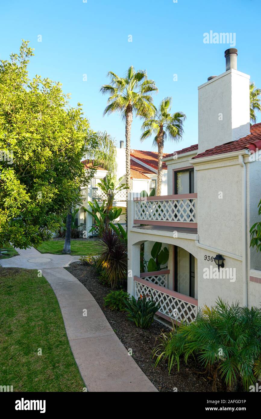 Typical Southern California Spanish style residential condo surrounded ...