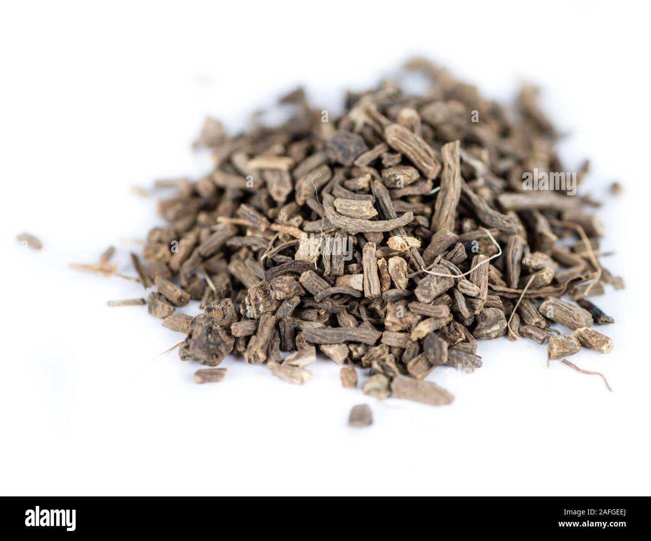 Dried Valerian roots (detailed close-up shot) isolated on white ...