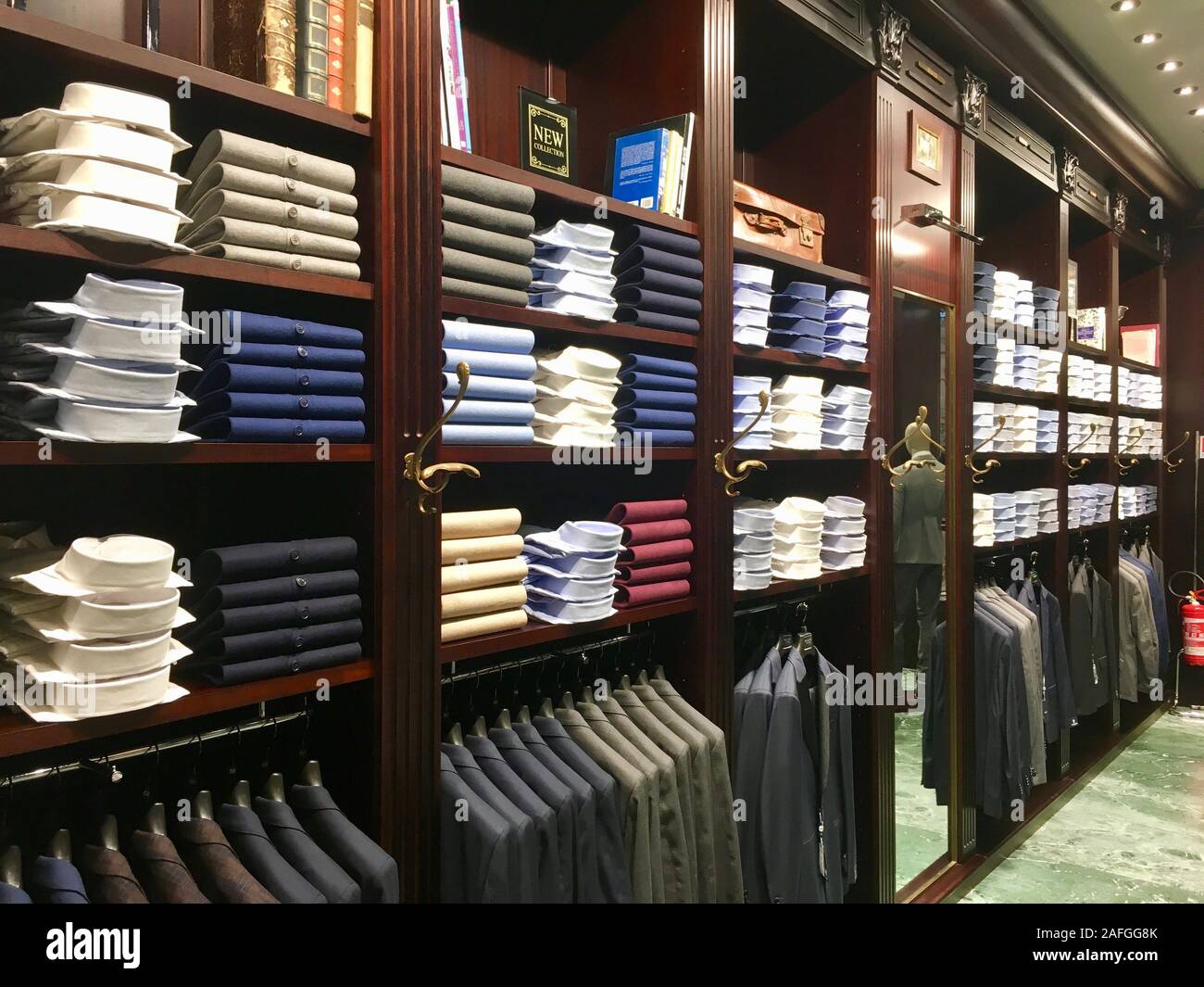 Shirts and suits in an exclusive shop Stock Photo - Alamy