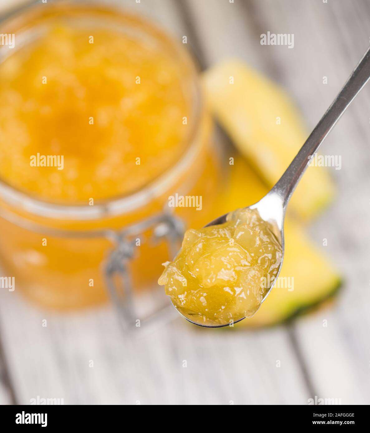 Fresh made Pineapple Jam on a vintage background as detailed close-up ...