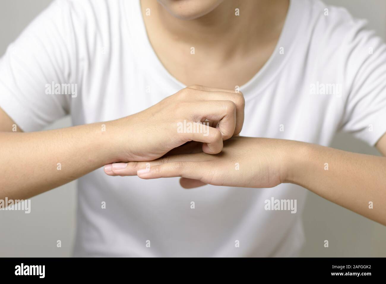 Women itch and scratching at hand. Concept with healthcare and medicine ...