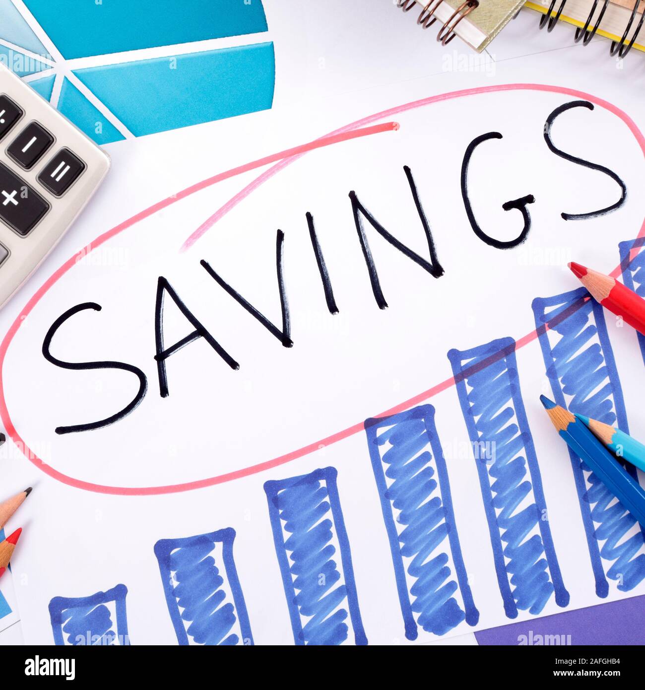 The word Savings written on a hand drawn bar chart surrounded by ...