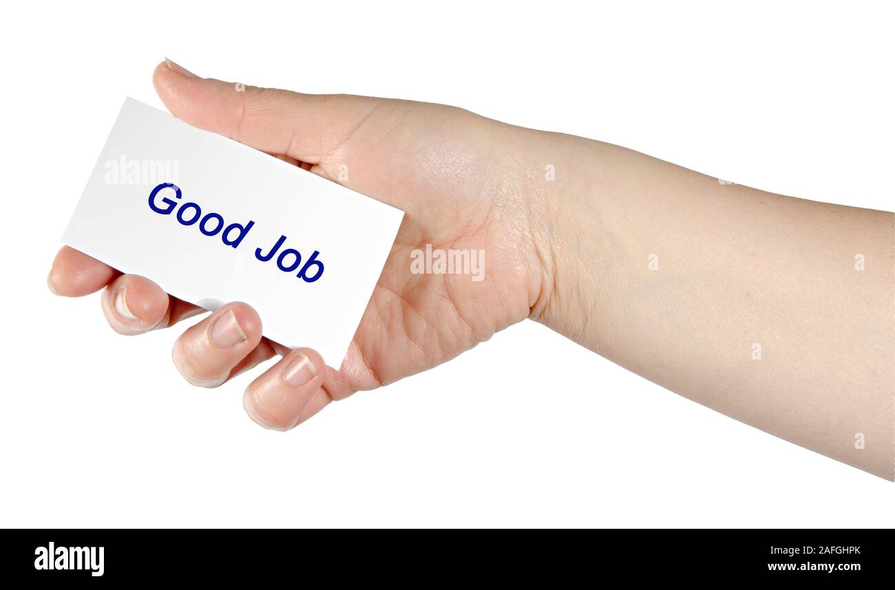 Hand with card GOOD JOB Stock Photo - Alamy