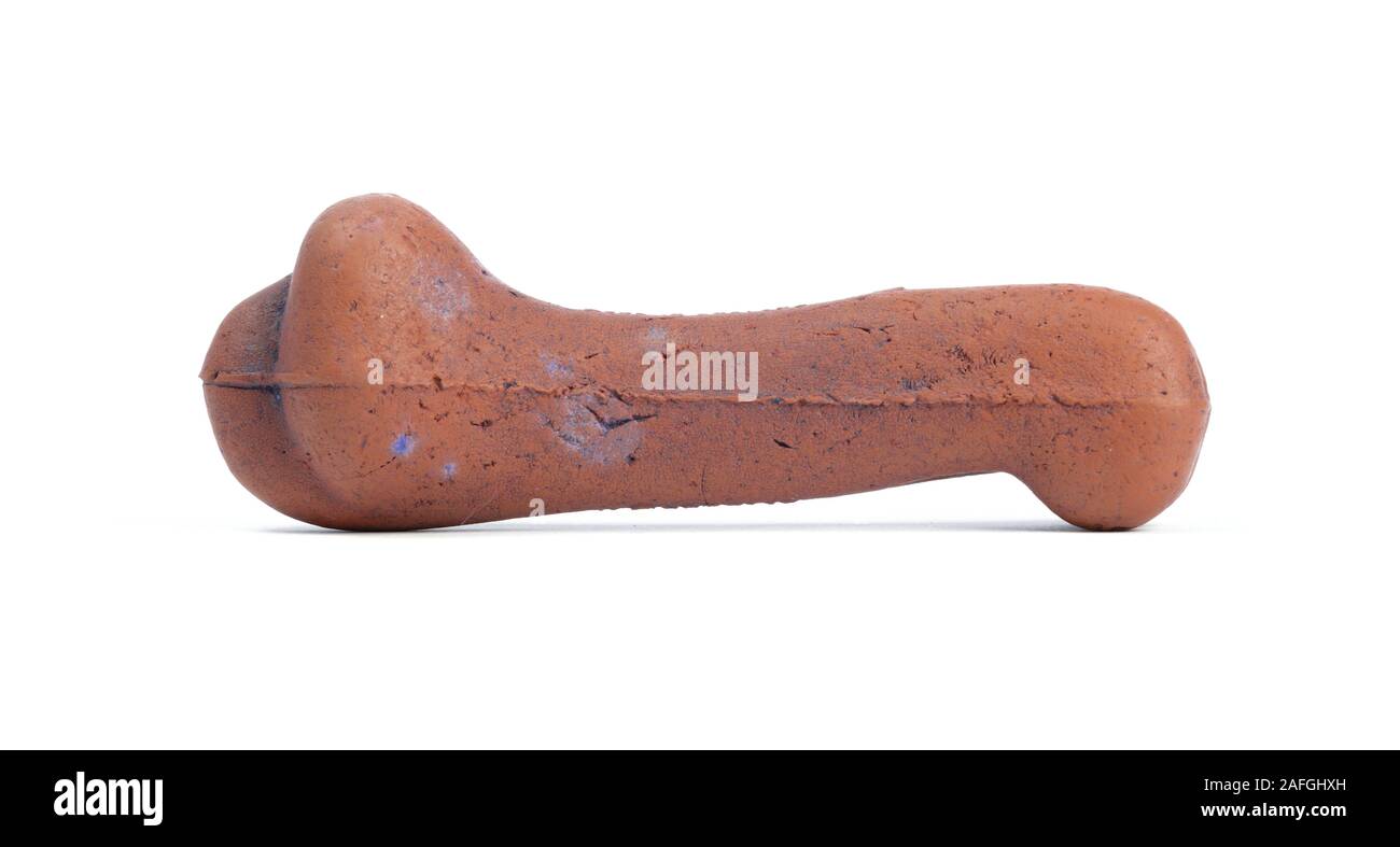 Old bone rubber toy for dogs, isolated Stock Photo - Alamy