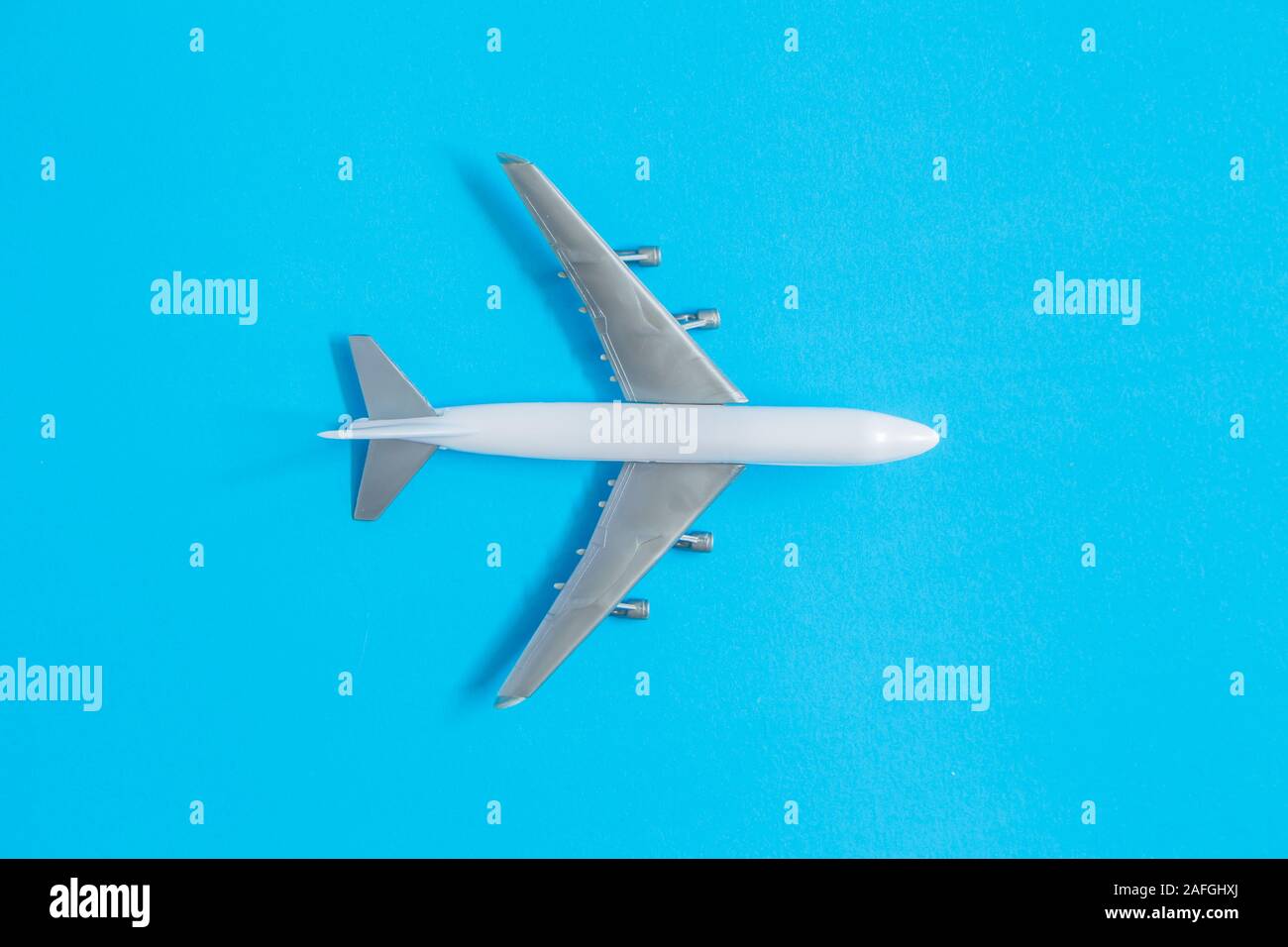 Modern passenger plane on sky paper backdrop. Concept of aircraft ...