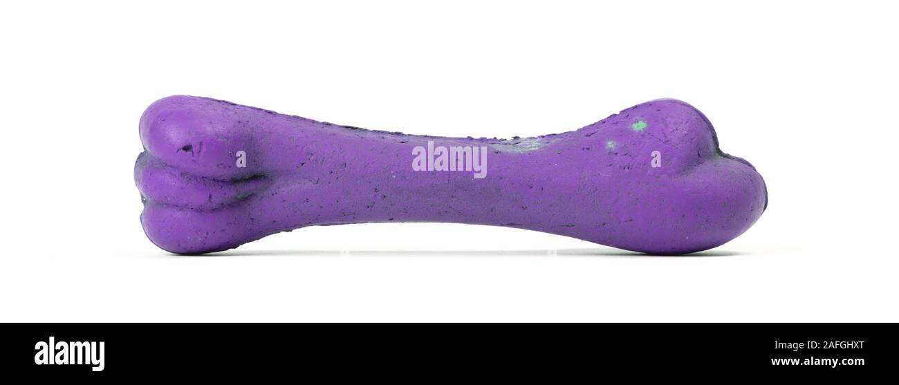 Old bone rubber toy for dogs, isolated Stock Photo - Alamy
