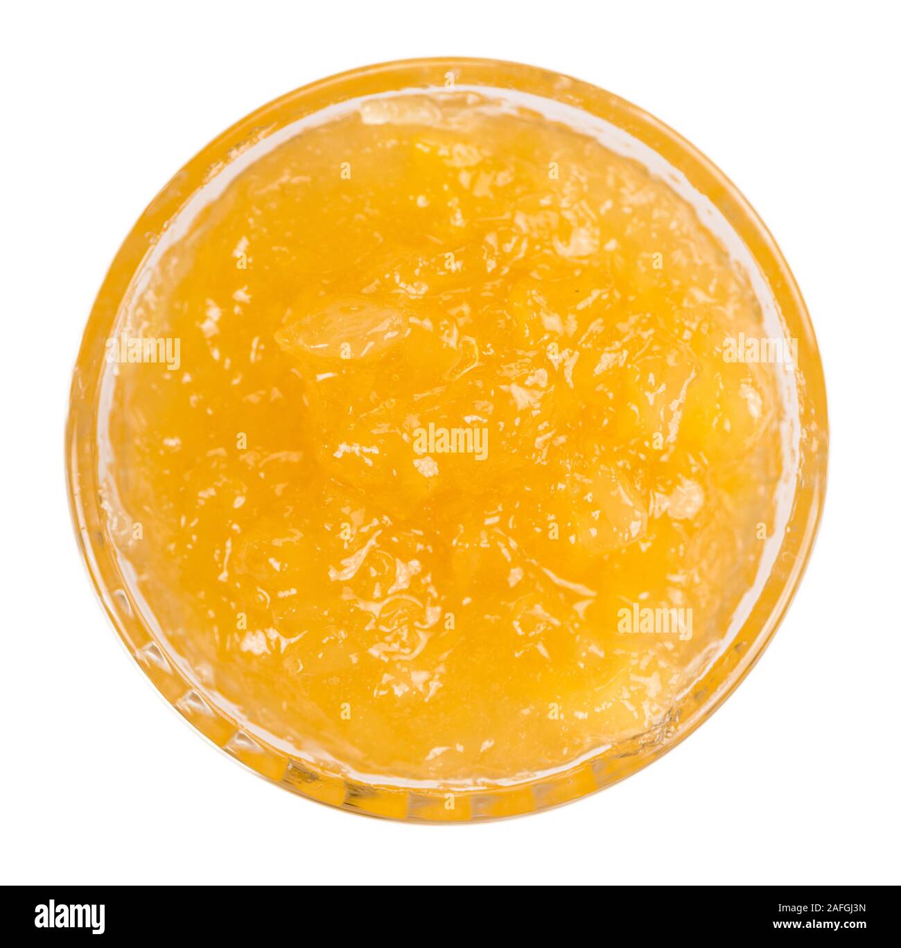 Fresh made Pineapple Jam isolated on white background; close-up shot ...