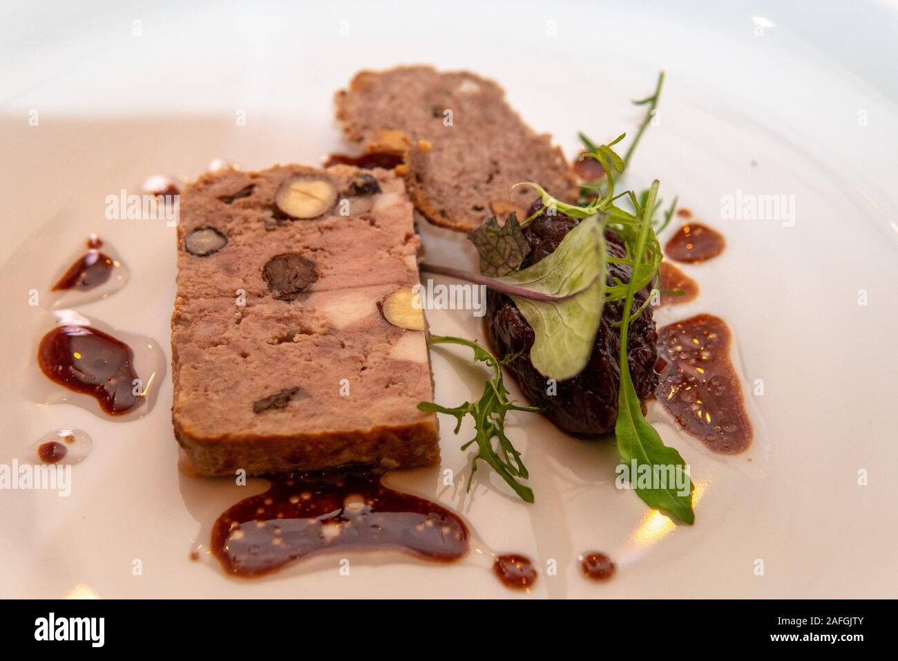 French cuisine pate with green lettuce and sauce Stock Photo - Alamy