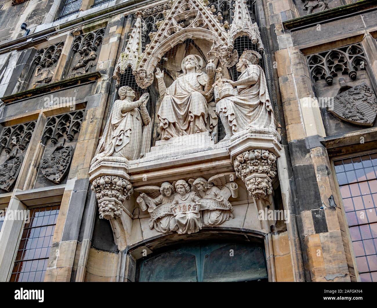 1 Religious statue on the outside of an ancient medieval church in the ...