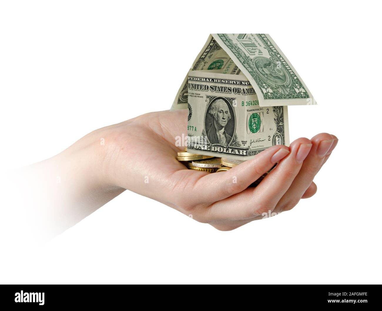 Money home in hand Stock Photo - Alamy