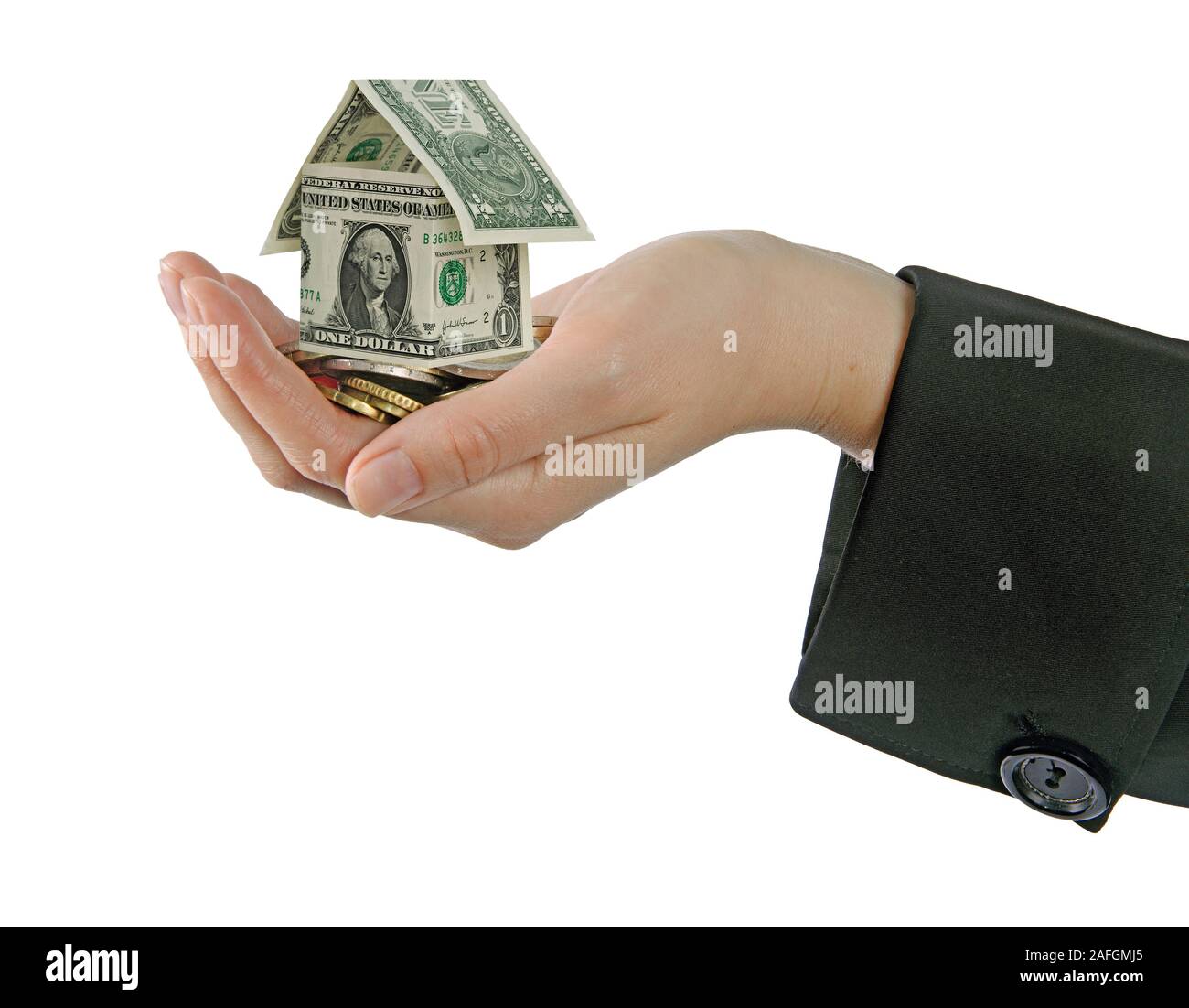 Money home in hand Stock Photo - Alamy