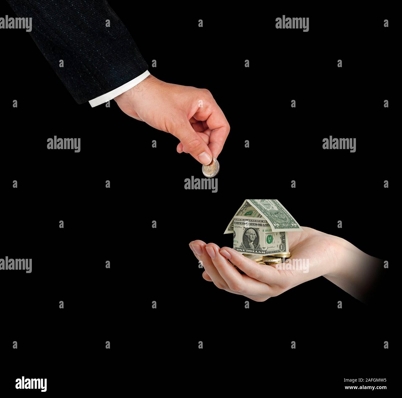 Money home in hand Stock Photo - Alamy