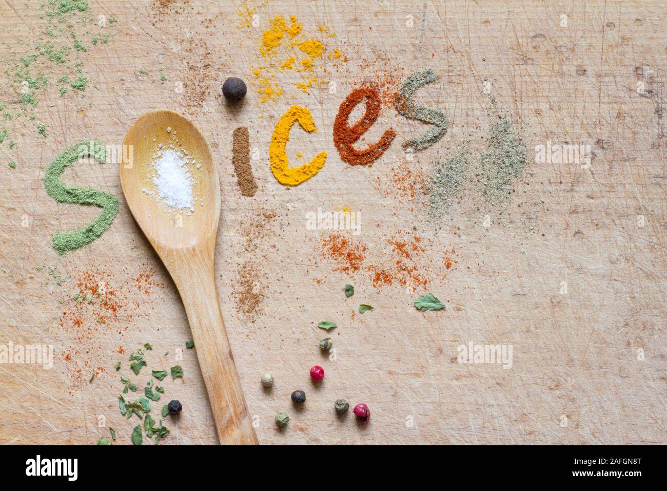 Spice text made with spice mix and spoon Stock Photo - Alamy