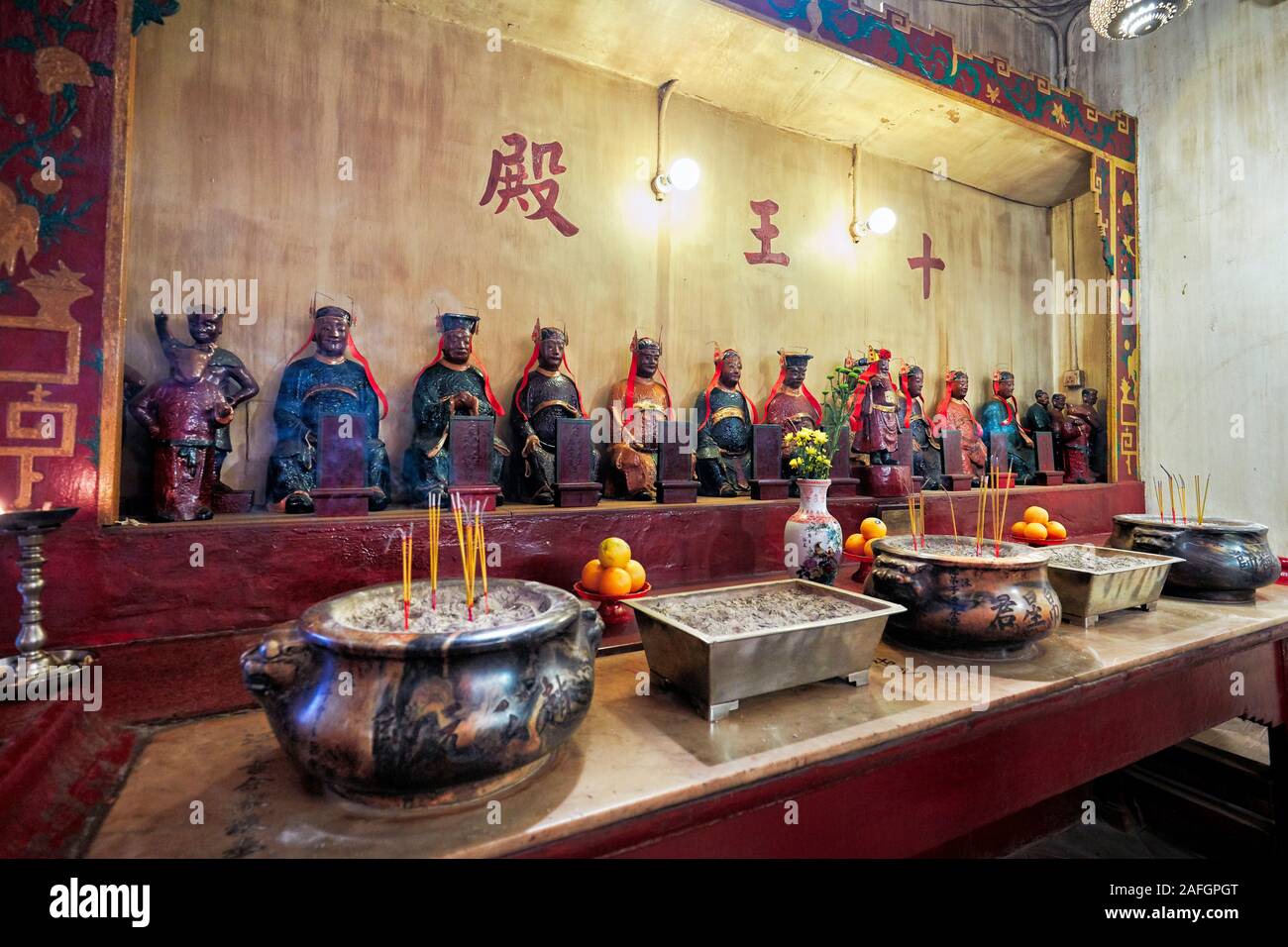 Altar with offerings in Man Mo Temple, dedicated to the civil god Man ...