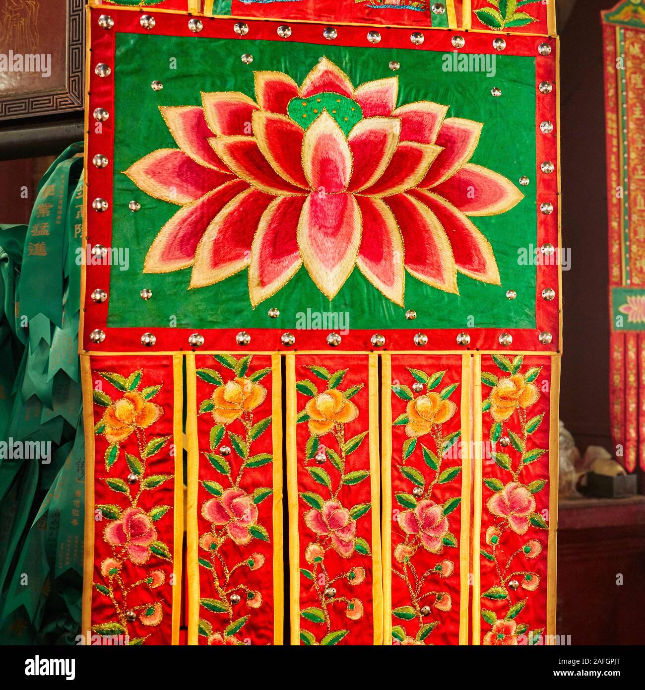 Colorful lotus embroidery in Man Mo Temple dedicated to the civil god ...