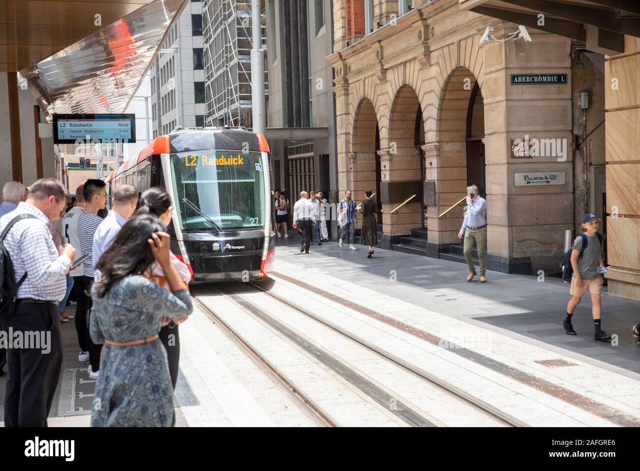 Sydney light rail tram, passengers wait for the light rail train on its ...