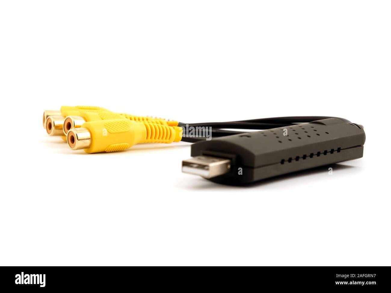 USB video audio capture adapter VHS to DVD hdd tv card on a white ...