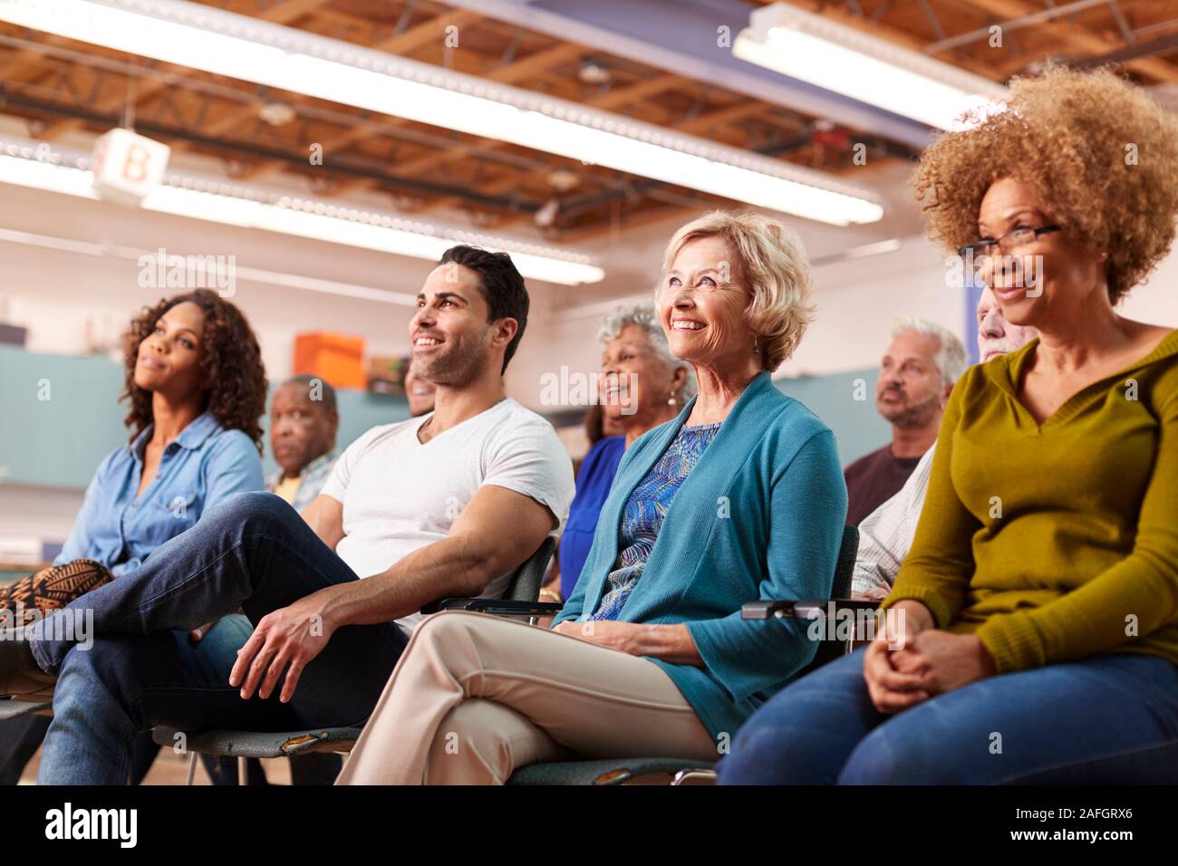 Group Attending Neighborhood Meeting In Community Center Stock Photo ...