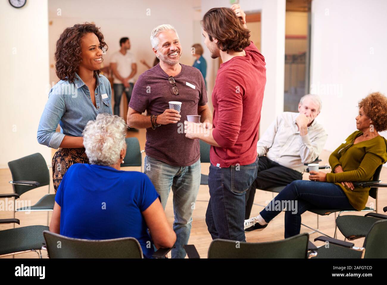Person meeting with a group hi-res stock photography and images - Alamy