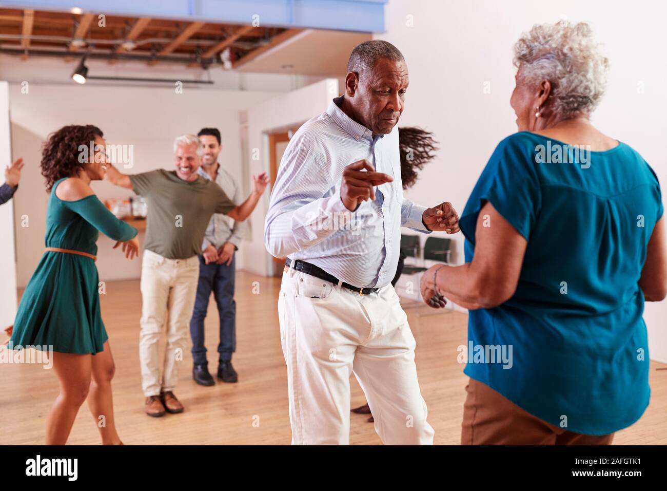 People Attending Dance Class In Community Center Stock Photo - Alamy