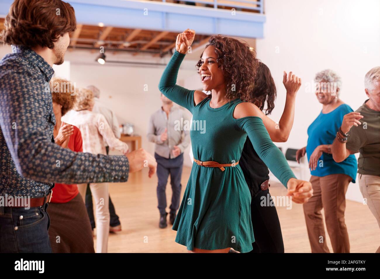 People Attending Dance Class In Community Center Stock Photo - Alamy