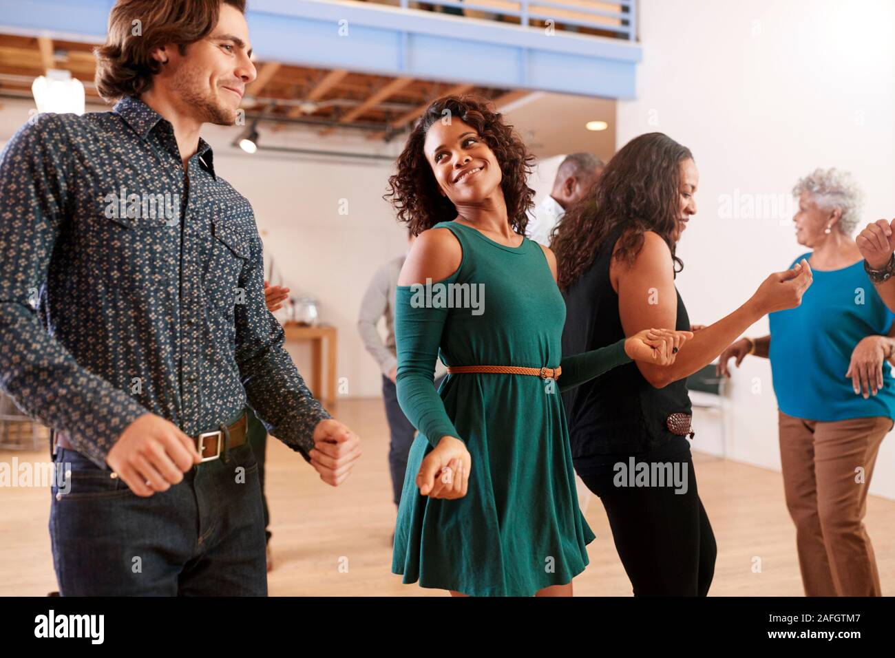 People Attending Dance Class In Community Center Stock Photo - Alamy