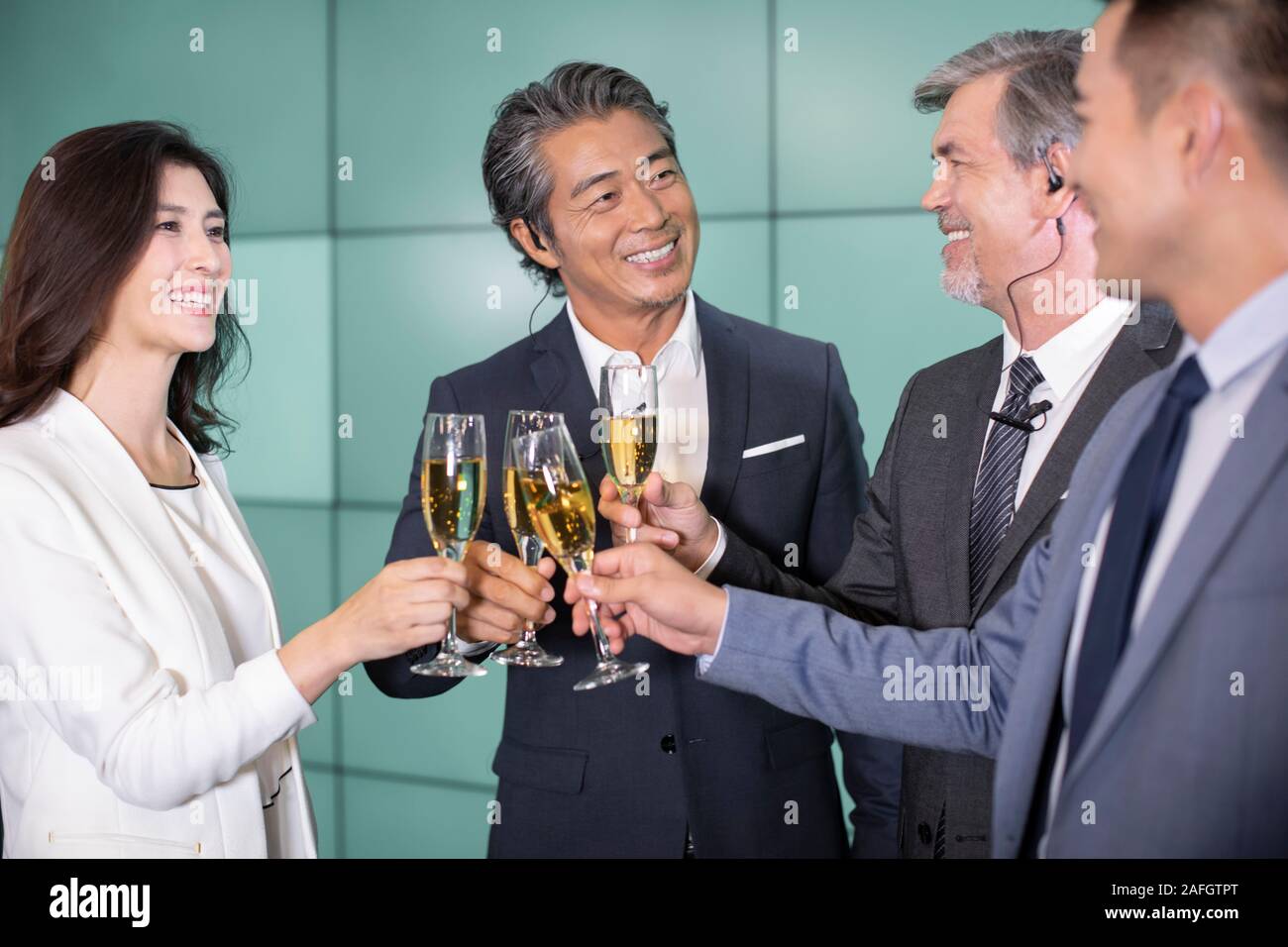 Business people toasting champagne Stock Photo - Alamy