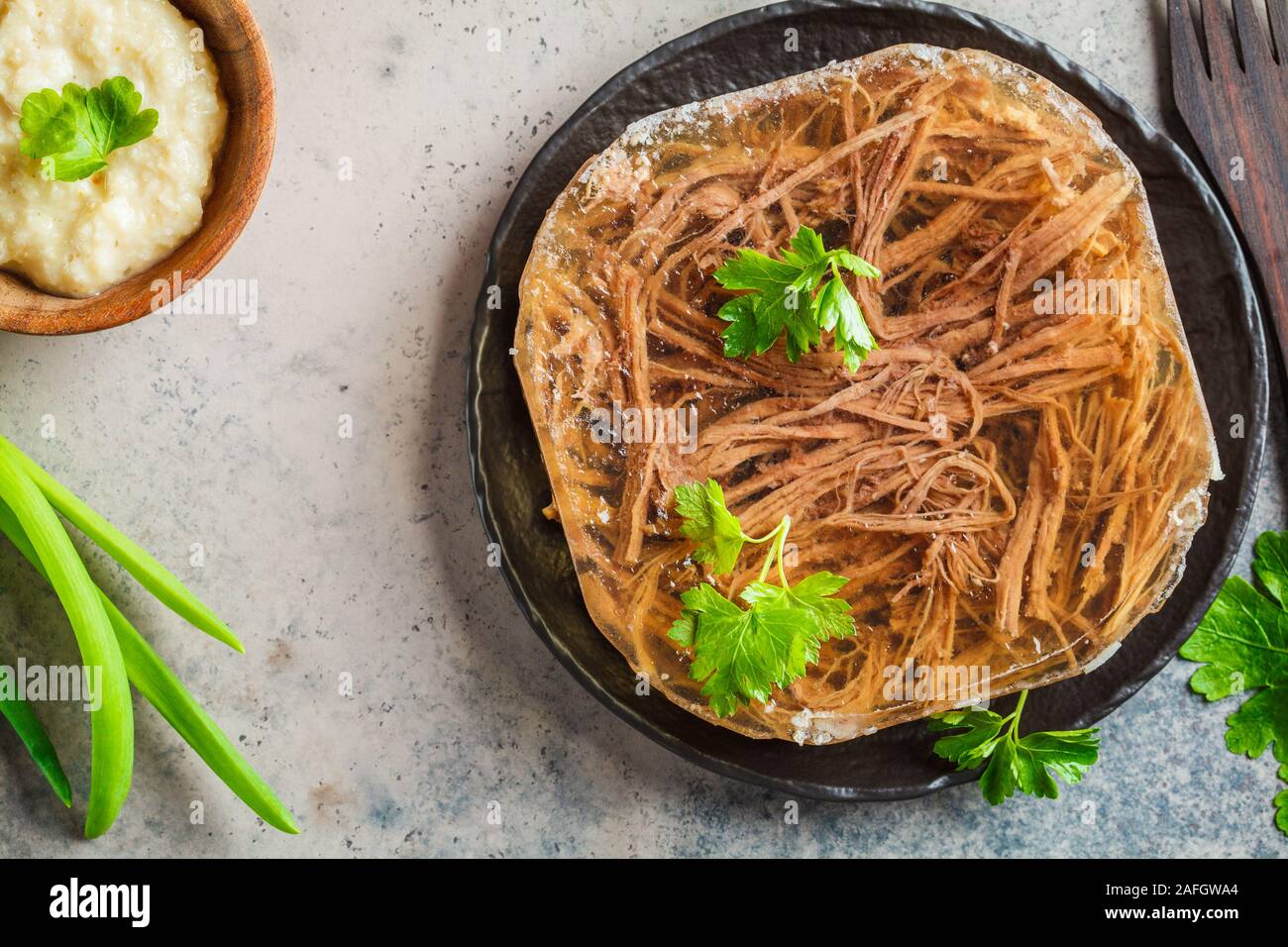 Traditional Russian pork and beef jellied meat with horseradish and ...