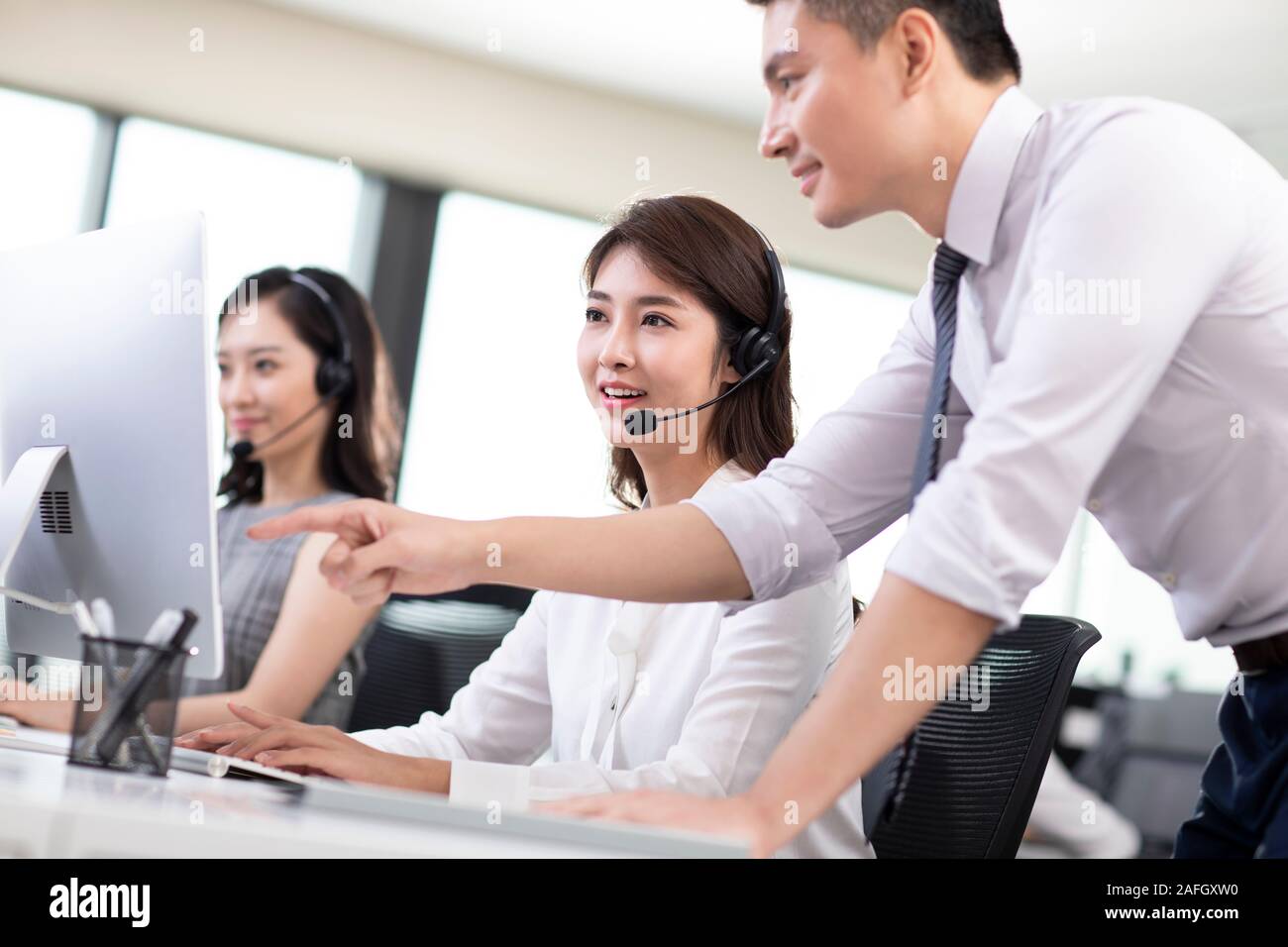 Chinese call center team hi-res stock photography and images - Alamy