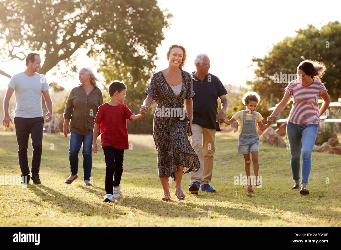 Family generation grandparent flare hi-res stock photography and images ...