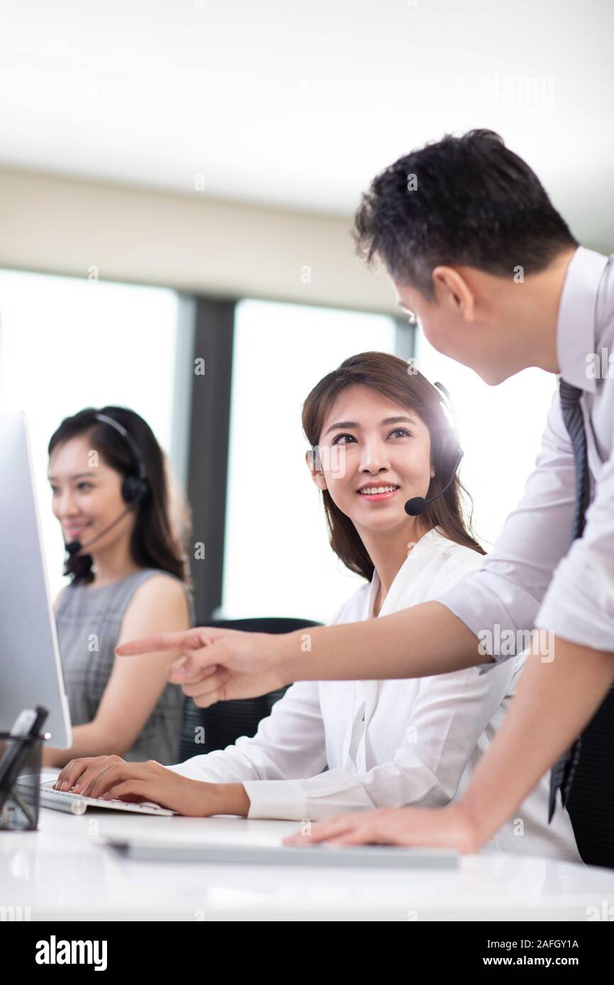 Team professional call center agents hi-res stock photography and ...