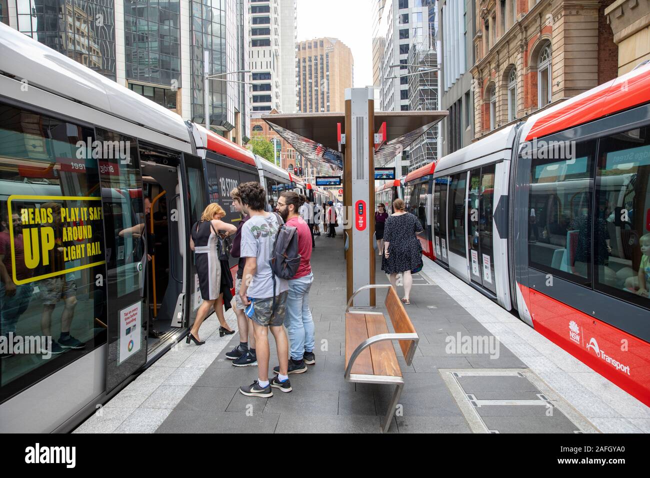 Sydney light rail tram, passengers wait for the light rail train on its ...