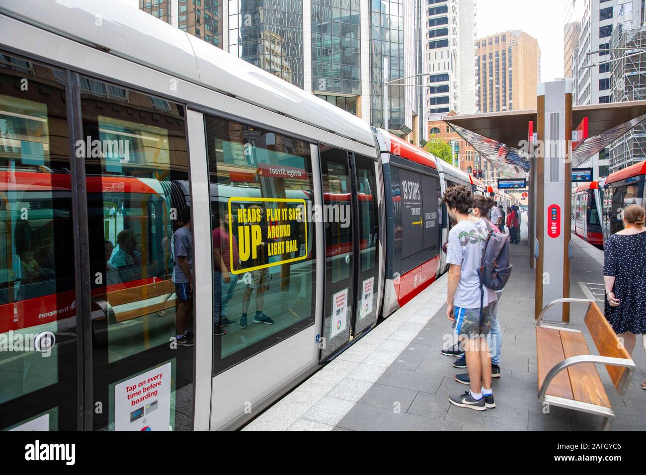 Sydney light rail tram, passengers wait for the light rail train on its ...