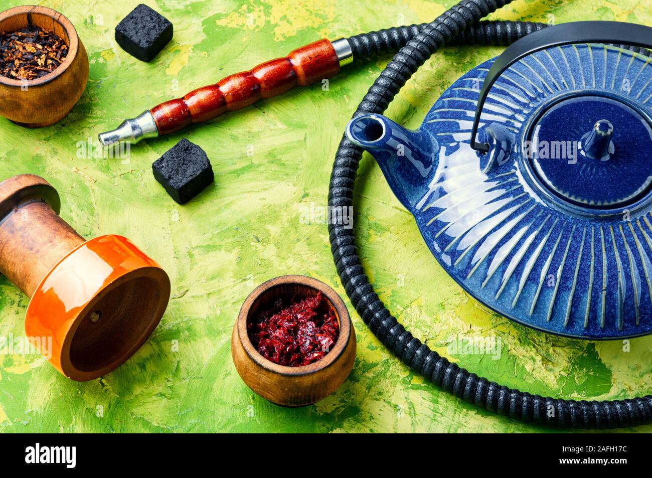 Details of tobacco hookah and teapot with tea.Egyptian smoking shisha ...