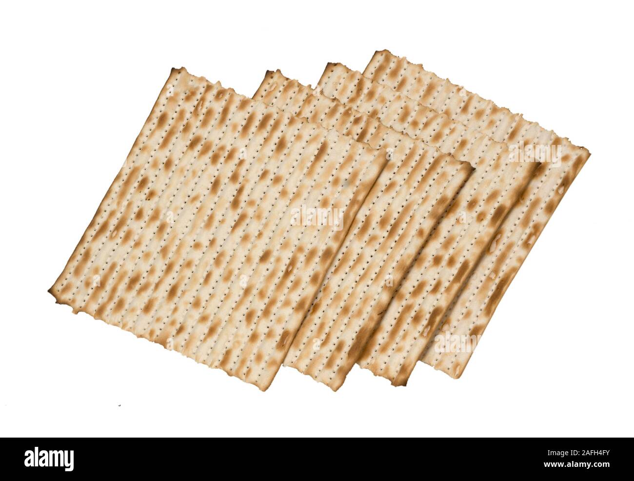 Close up of square matza isolated on white background Stock Photo - Alamy