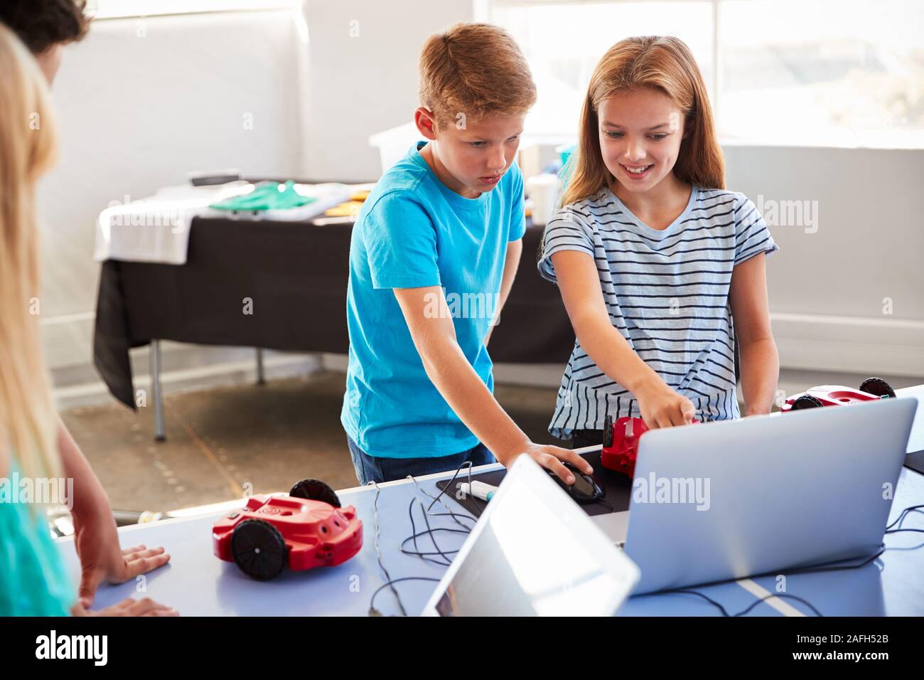 Two Students In After School Computer Coding Class Learning To Program ...