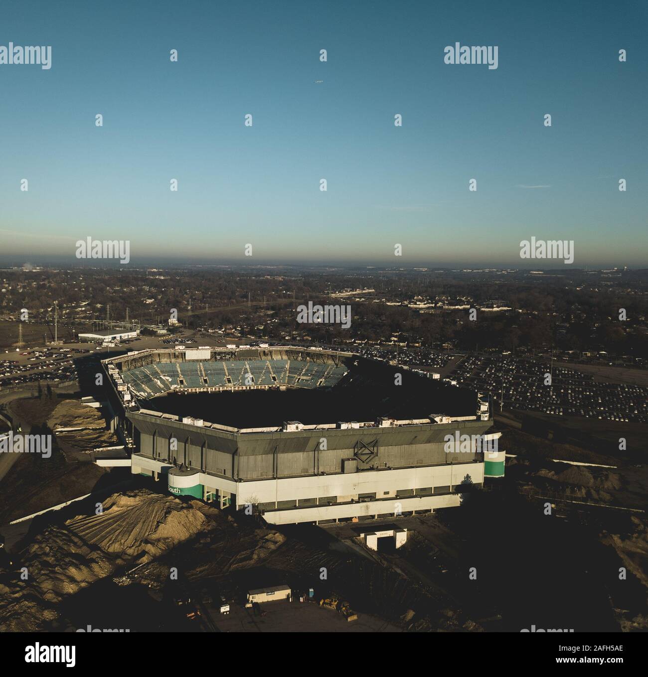 Aerial picture of a town with a stadium surrounded by roads and ...